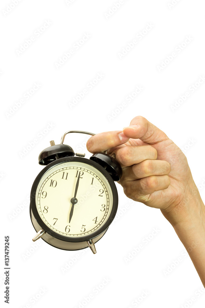 Hand holding a clock, isolated on white background with clipping path ...