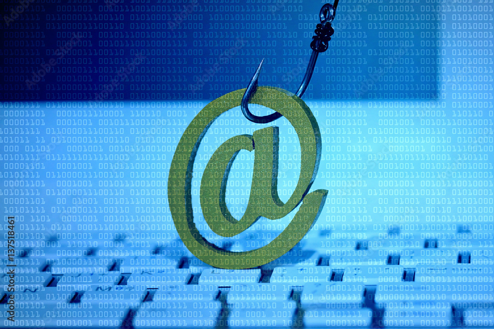 Email sign with a fish hook on computer keyboard. Email security and ...
