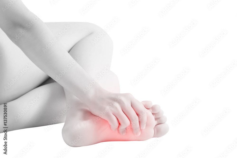 Acute pain in a woman feet isolated on white background. Clipping path ...