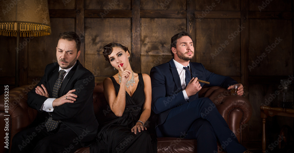 Rivalry or competition between two handsome rich executive men for ...