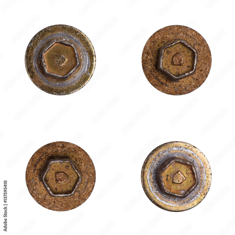 Four old screw heads isolated on white background. Screw heads with ...