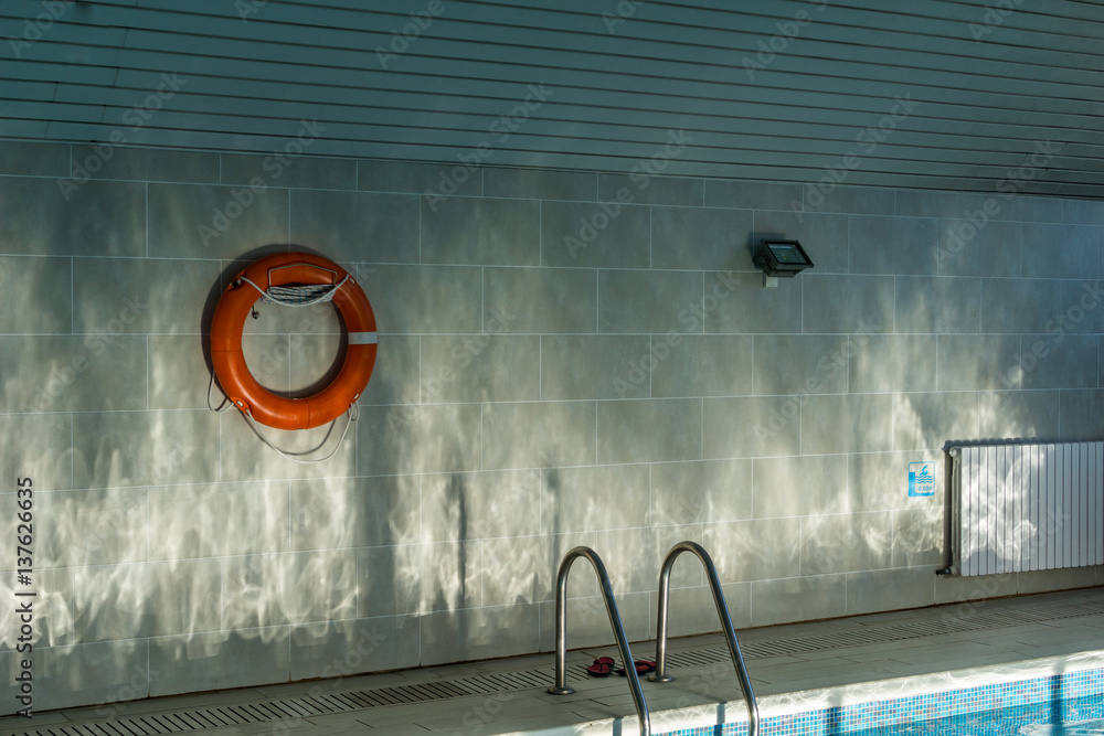 water reflecting sun on a swimming pool wall Stock Photo | Adobe Stock
