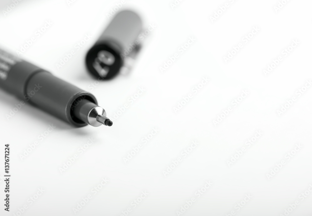 Close-up drawing pen on while background Stock Photo | Adobe Stock