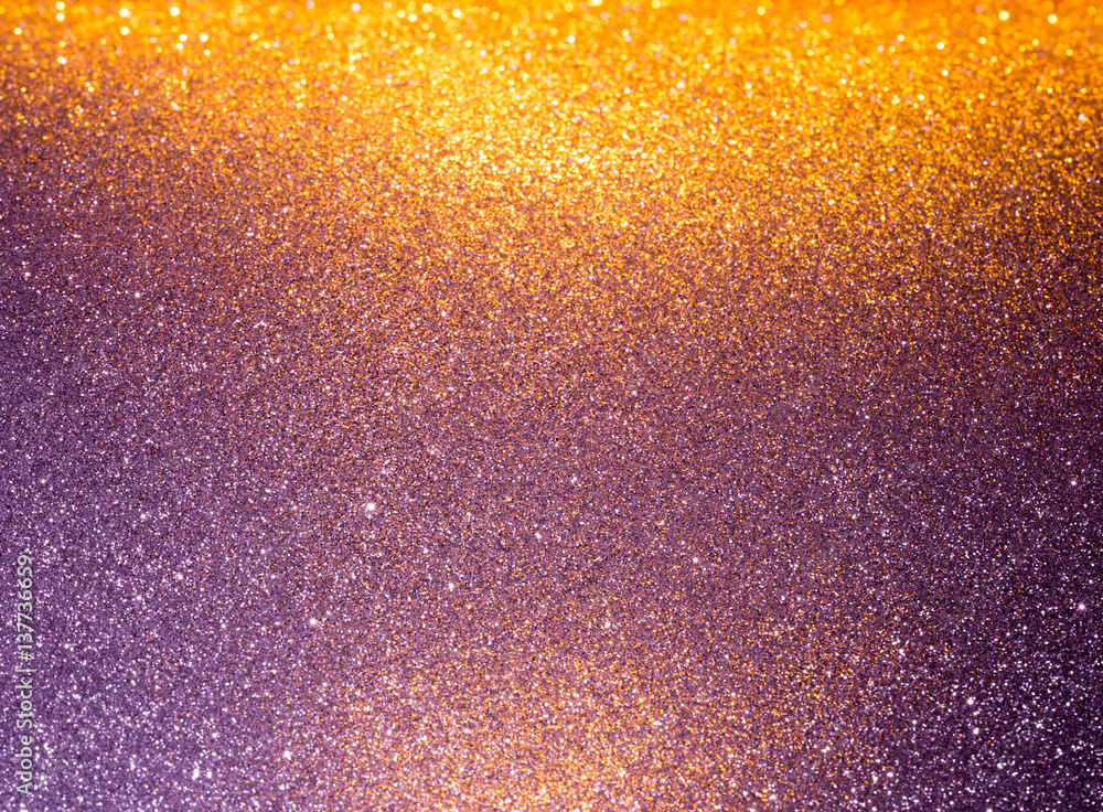 Abstract background filled with shiny gold and purple glitter Stock ...
