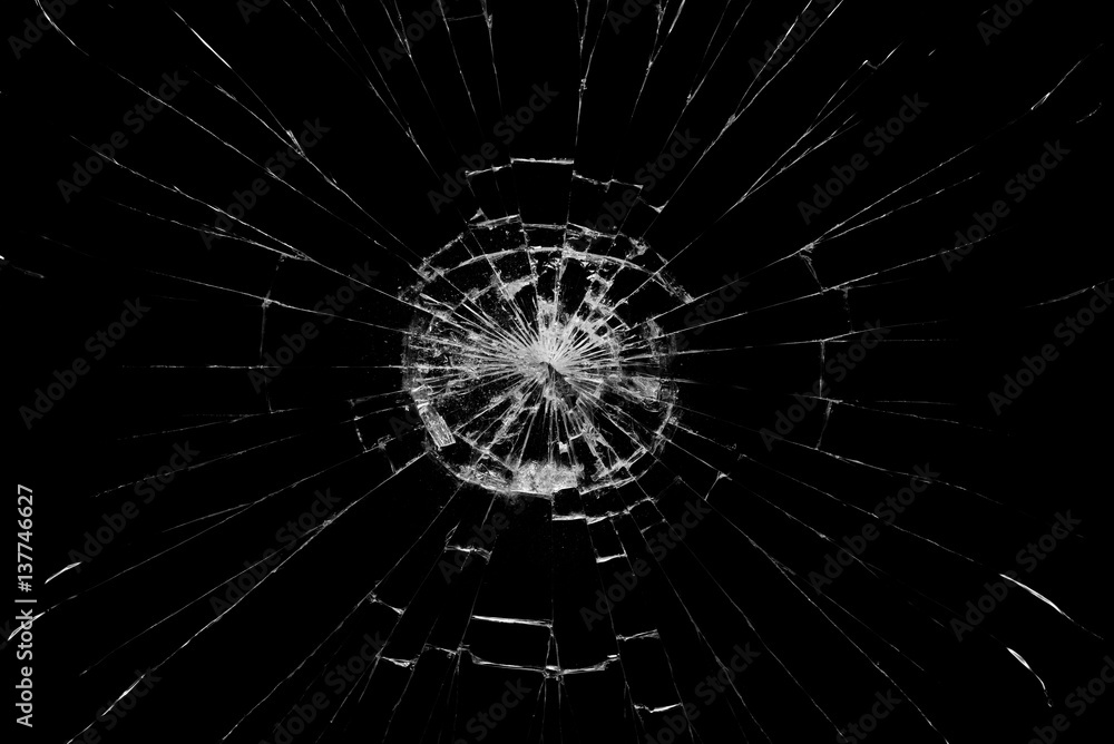 Broken glass on black background ,texture backdrop object design ...