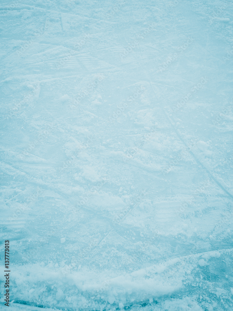 Close up photo of blue ice surface with scratches, space for texture or ...