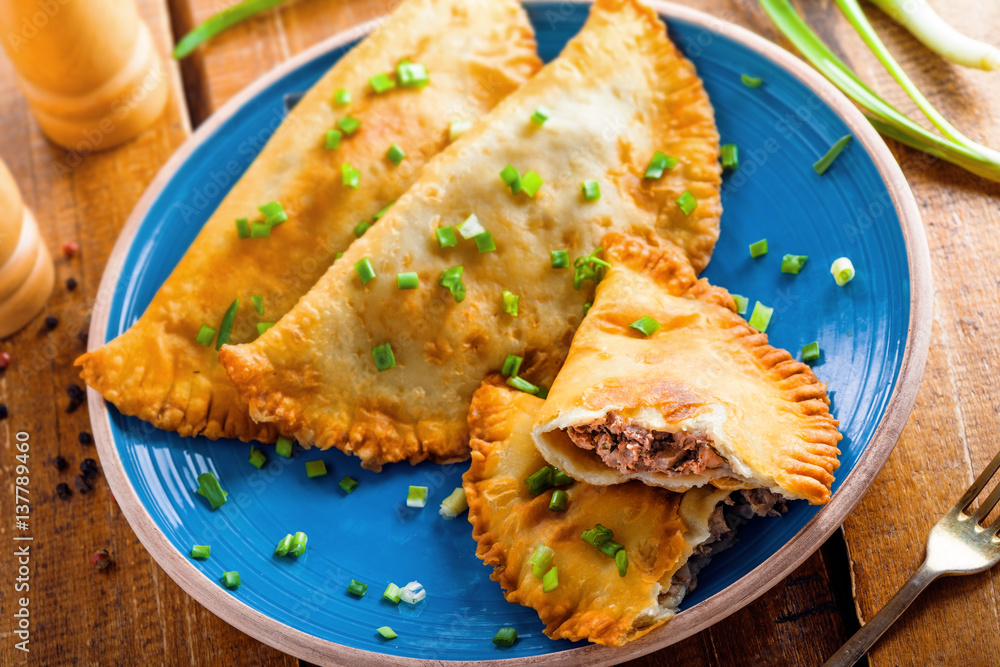 Foto de Chebureki with meat and spring onion. National Russian, Turkish ...