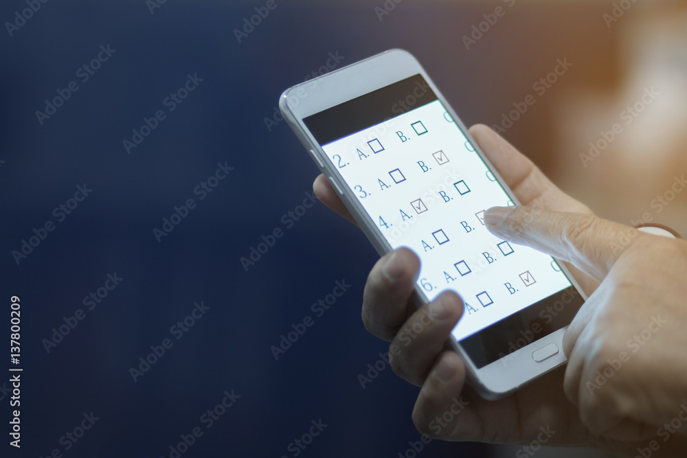 student testing in exercise, exams answer on a tablet with multiple ...