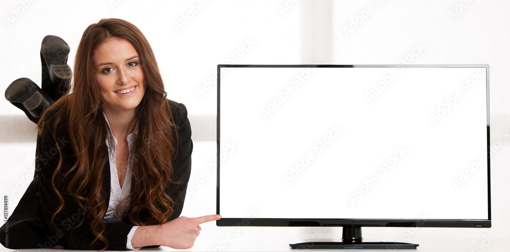 Beautiful business woman pointing to large screen with blank white ...