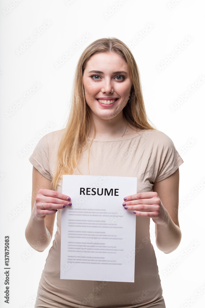 Young woman holding her resume Stock Photo | Adobe Stock