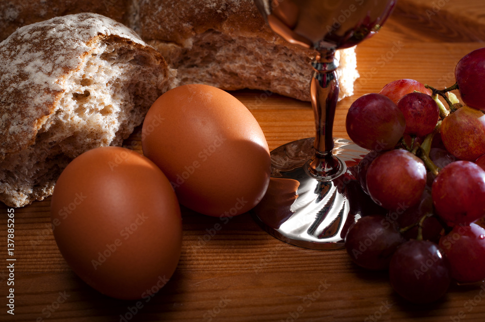 Holy Communion and Easter concept with The Holy Bible. Bread, eggs ...