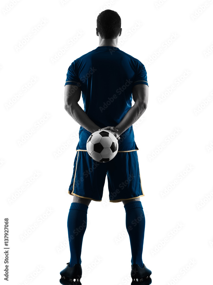 one caucasian soccer player man standing Rear View in silhouette ...