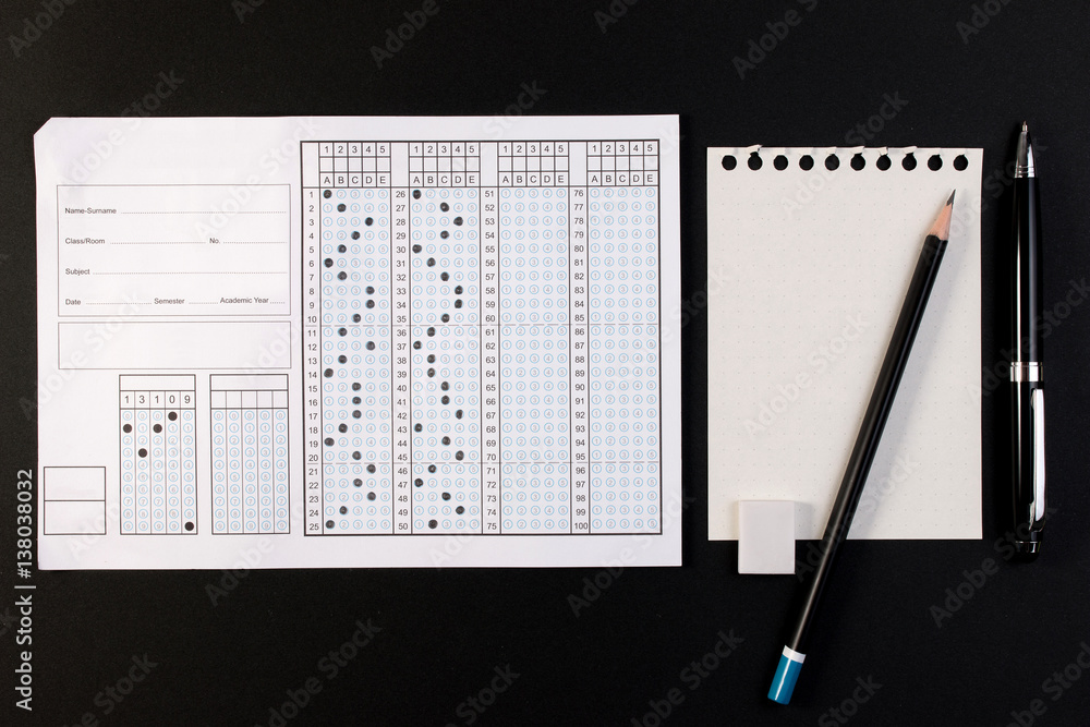 School exam answer sheet and pen. Standard test form or answer sheet ...
