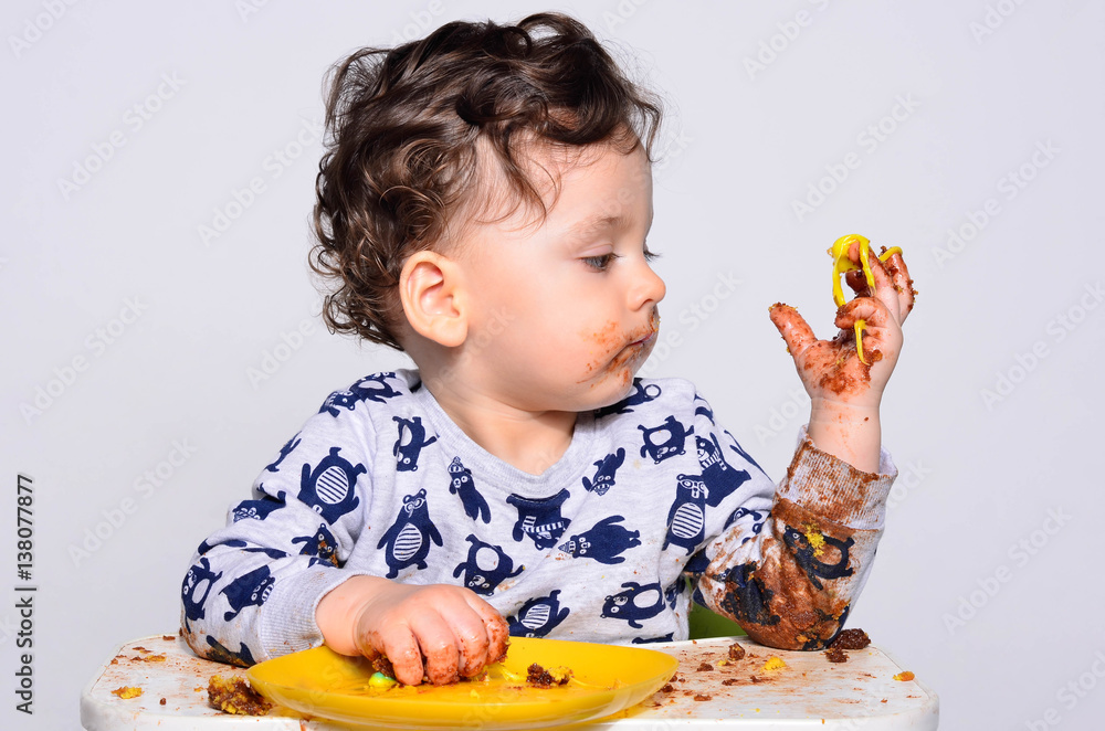 Messy Kid Eating Cake