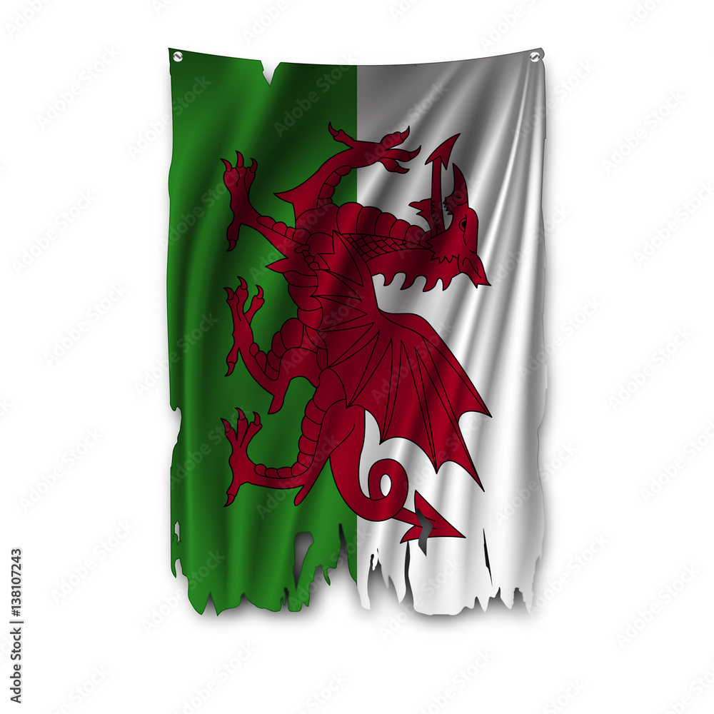 Torn by the wind national flag of Wales. Ragged. The wavy fabric on ...