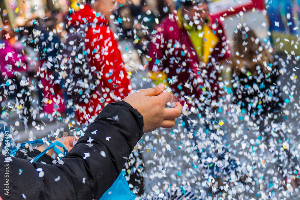 Hand launches confetti Stock Photo | Adobe Stock