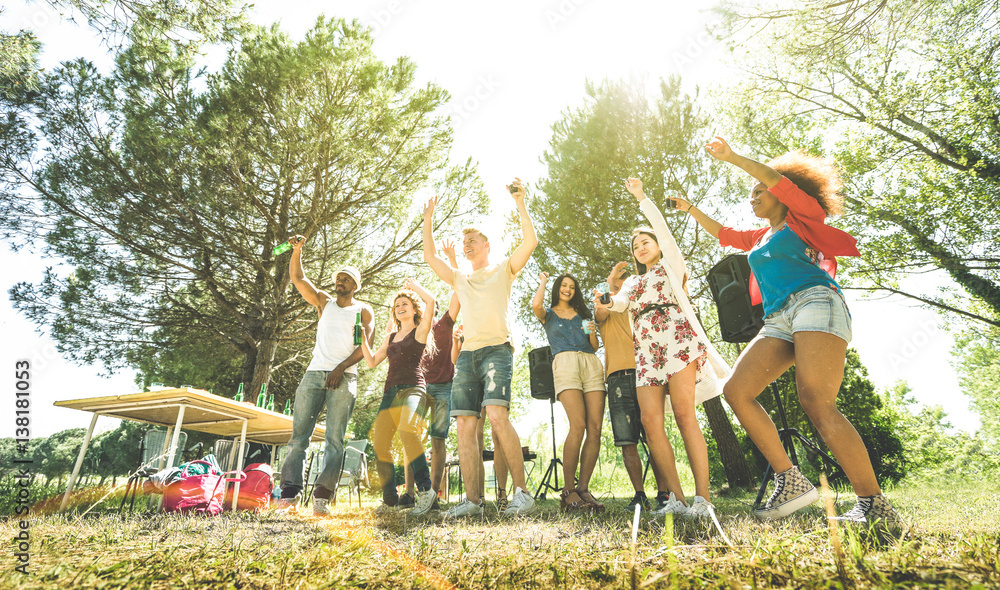 Multiracial friends having fun at barbecue pic nic garden party ...