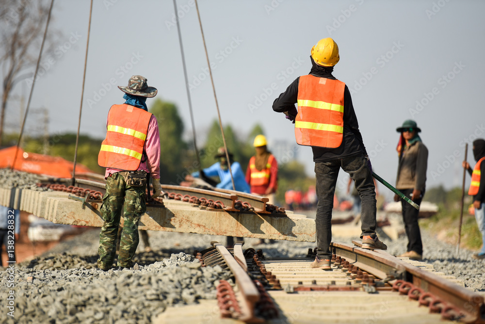 Construction team work in standard construction safety uniform ...