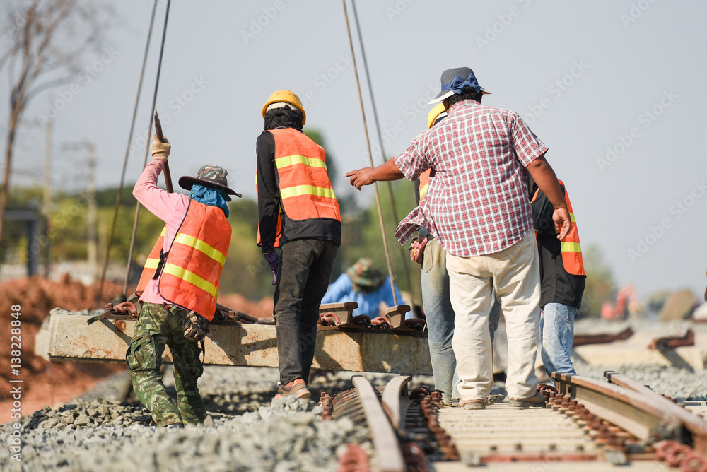 Construction team work in standard construction safety uniform ...