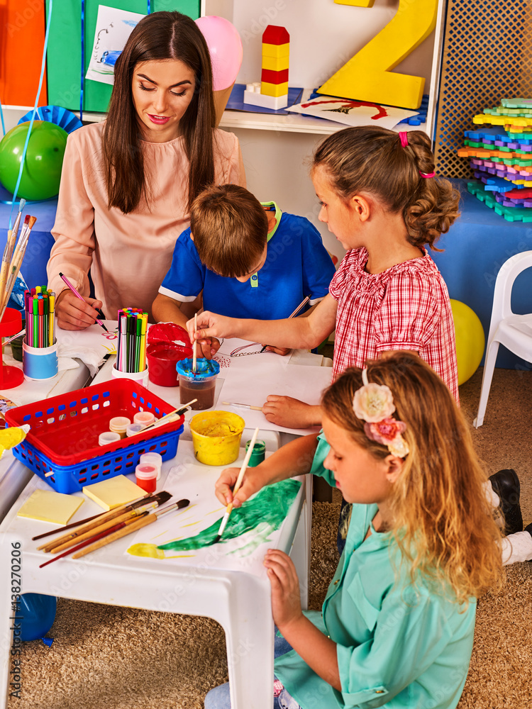 Children Coloring Together