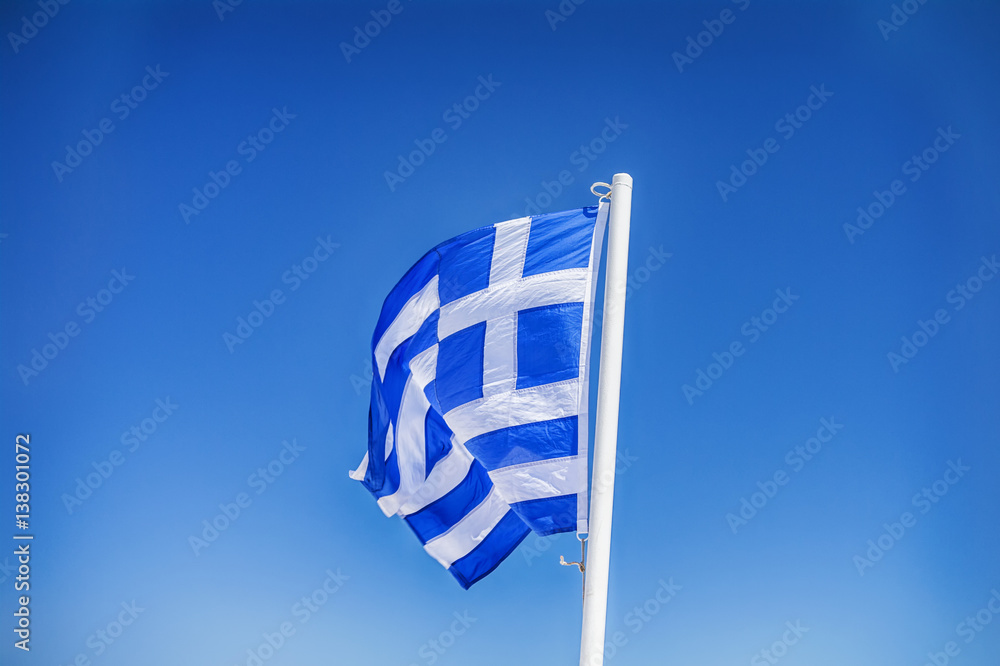 Greek flag in blue sky background Stock Photo | Adobe Stock