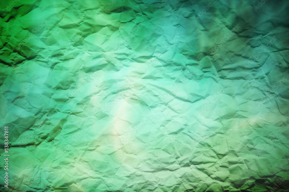 Green texture crumpled textured faded colors on a sheet of paper with ...