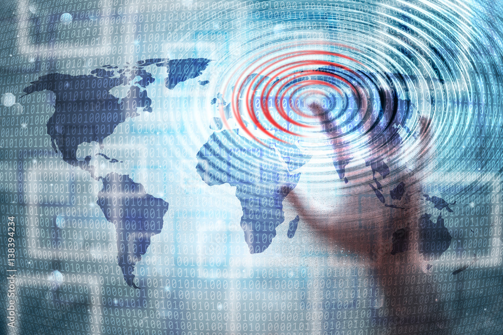 Abstract human hand touches the screen that displays world map and ...