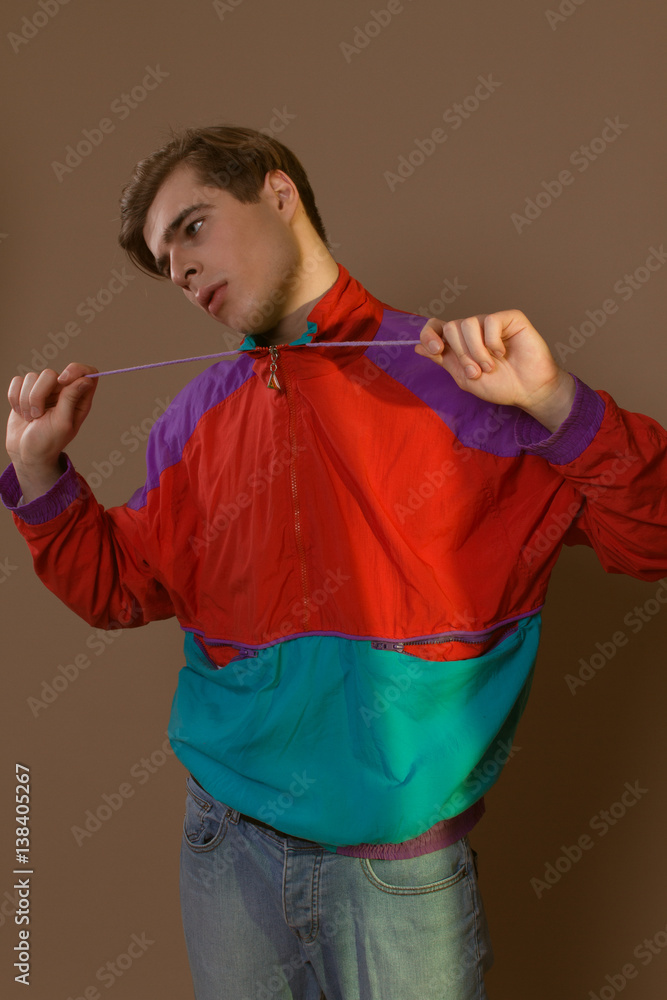 Cute guy in hipster clothes 90s posing in studio Stock Photo | Adobe Stock