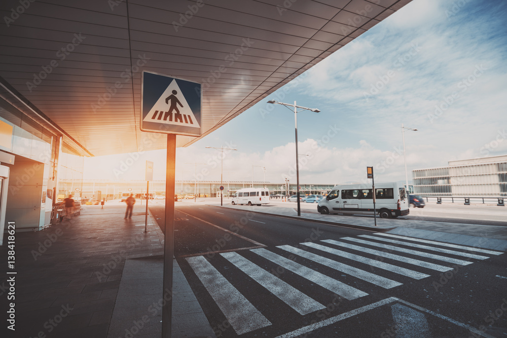 Pedestrian crossing next to contemporary modern airport terminal ...