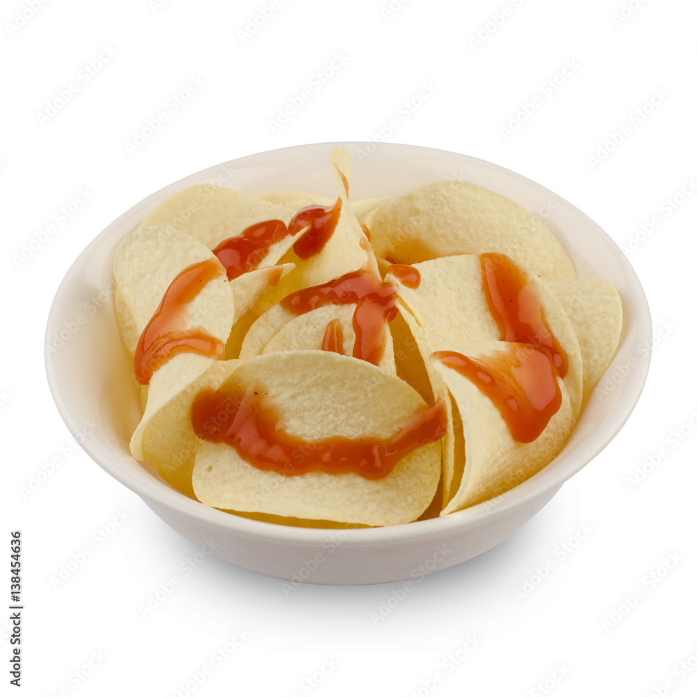 potato snacks with ketchup in a white bowl isolated on white Stock ...