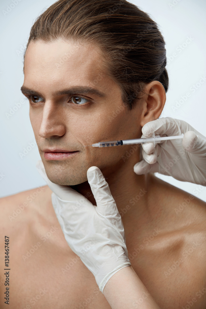 Male Beauty Injection. Handsome Man Receiving Facial Injections Stock ...
