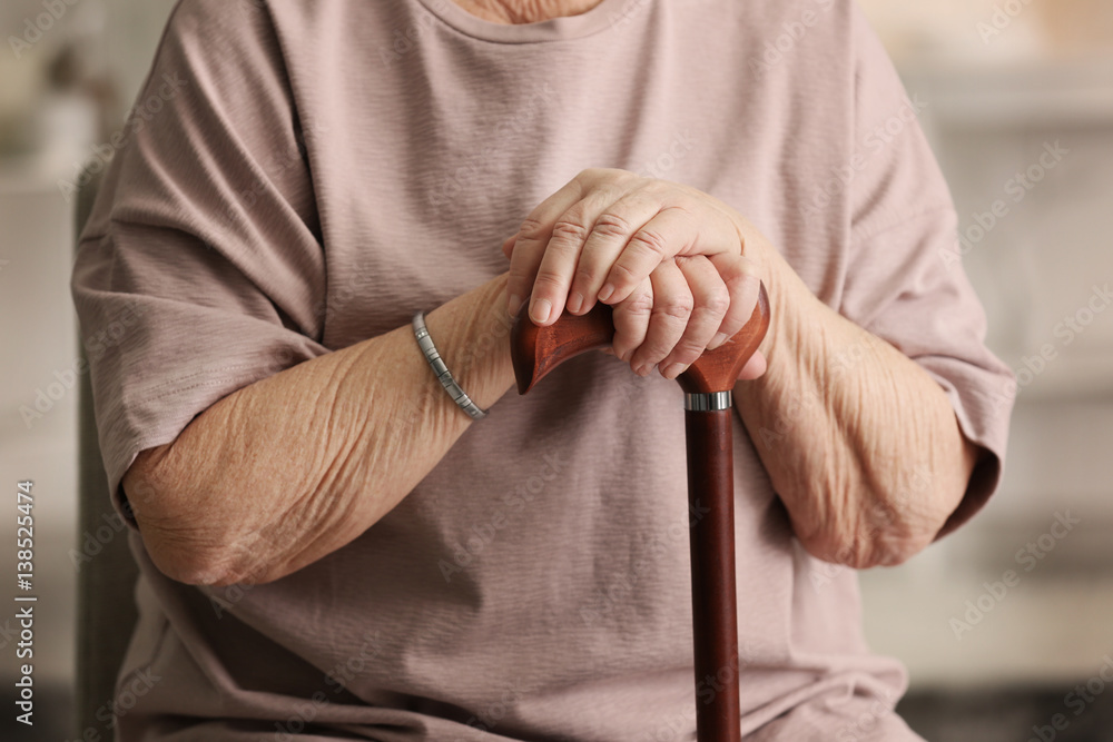 Female hands on walking stick closeup Stock Photo | Adobe Stock