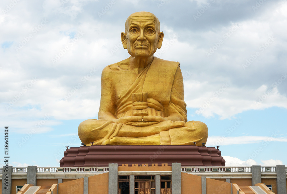 The Great Golden statue Monk at (Puttha Utthayan Maharat) Buddha Park ...