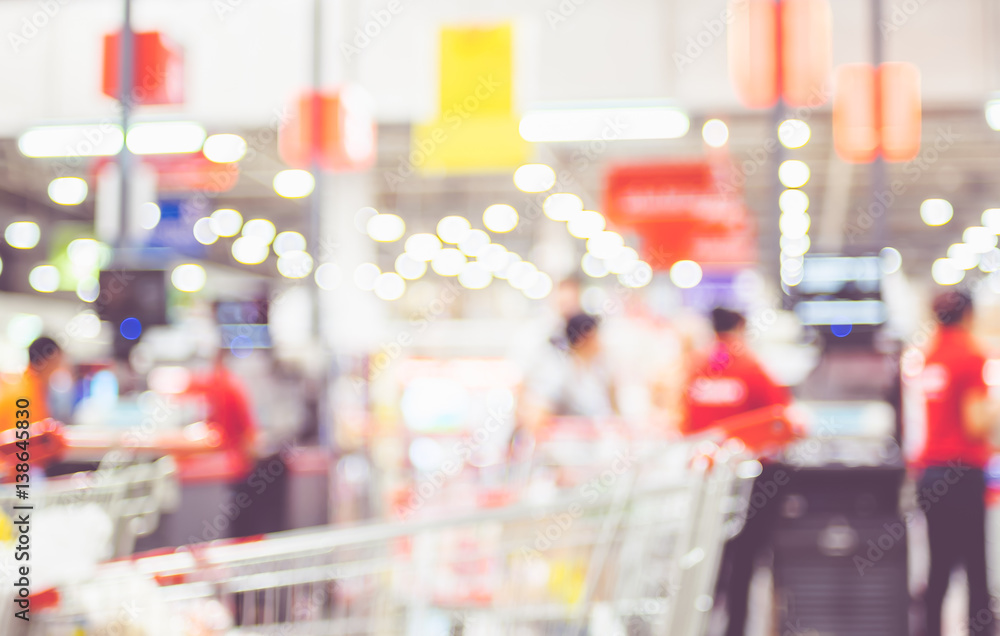 Blurred background of customer shopping at supermarket store blur ...