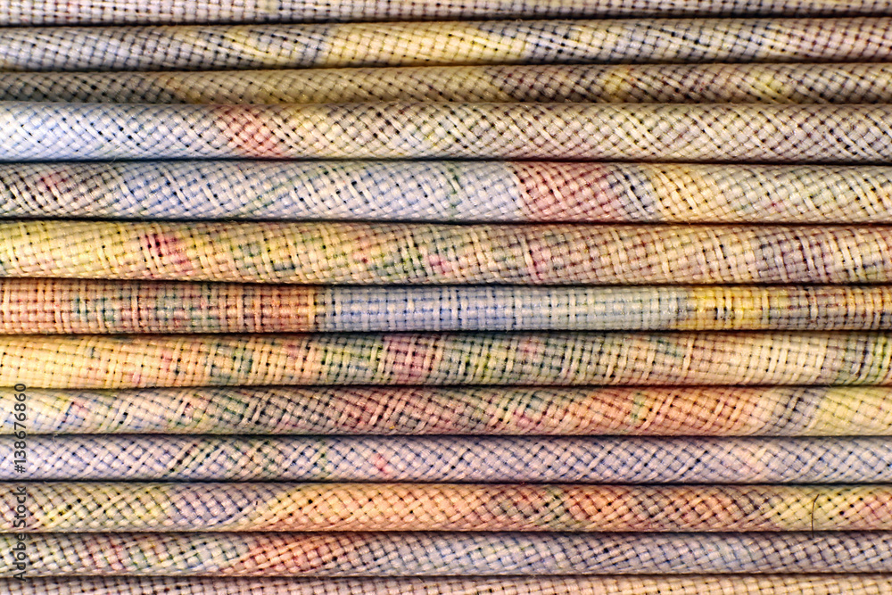 Stack of folded capron cloth. Horizontal layers of reticulated fabric ...