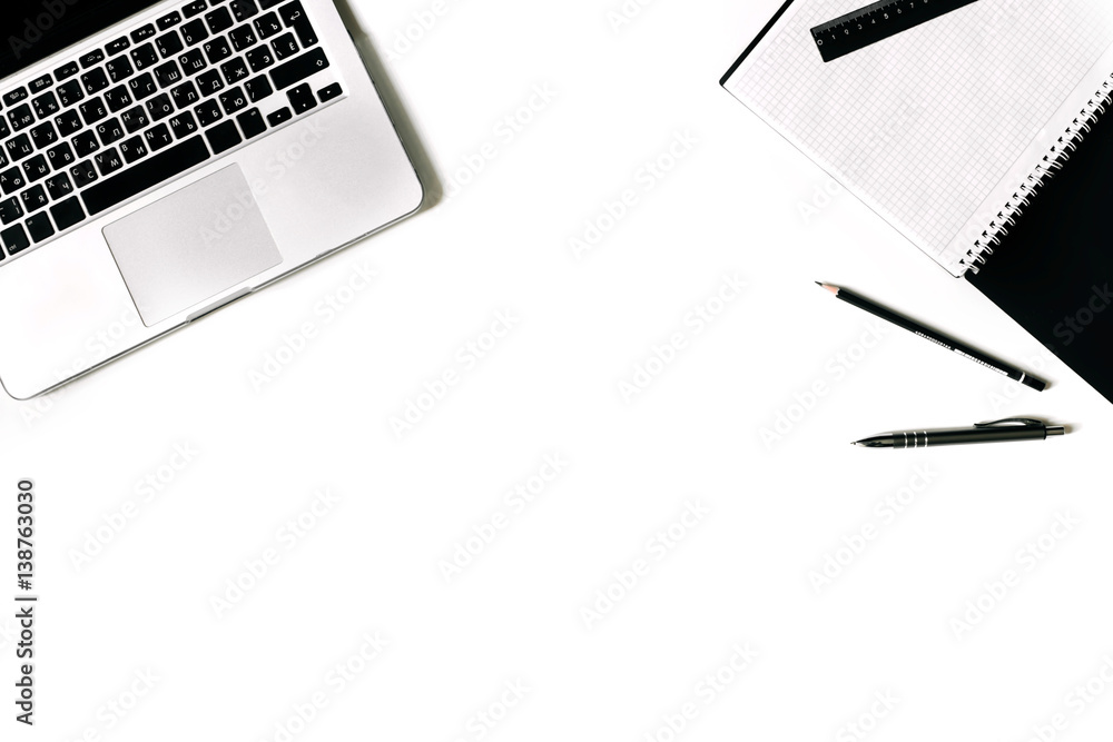 White office desk with laptop keyboard and supplies. Laptop, notebook ...