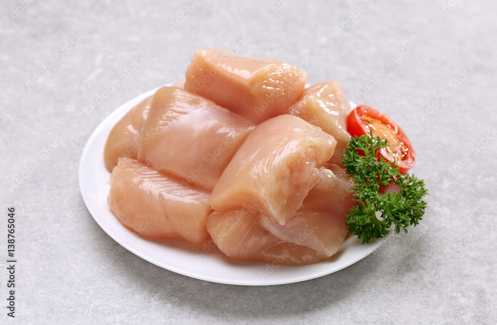 Raw chicken meat on grey background Stock Photo | Adobe Stock