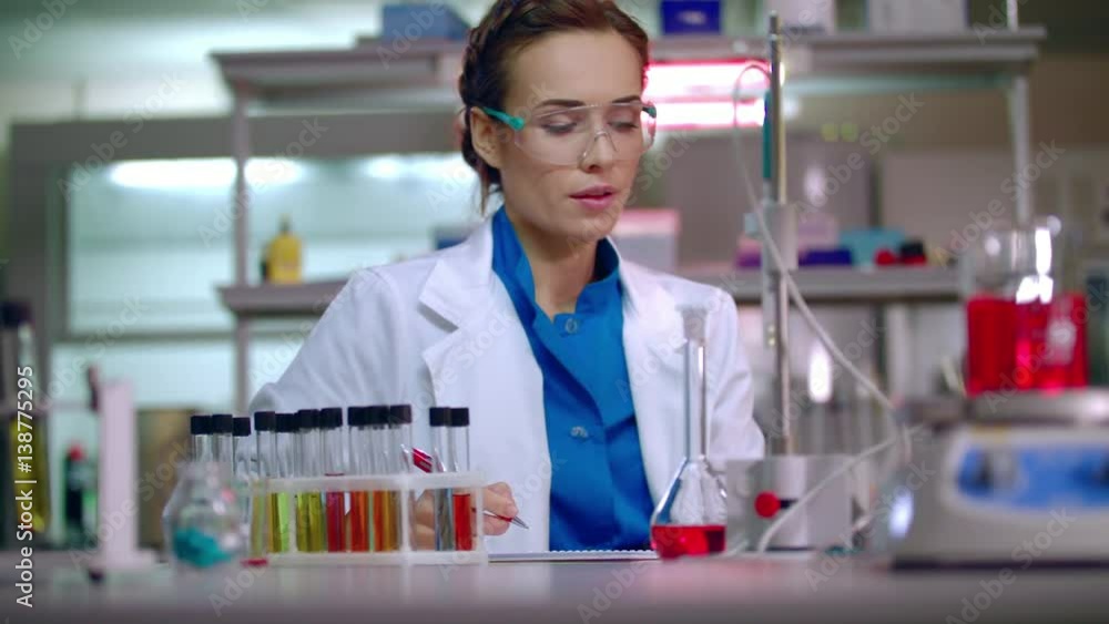 Lab team in science laboratory. Research team working in chemical ...