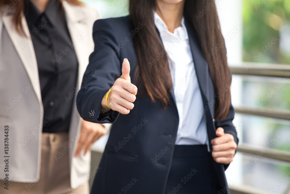 Good sign of Co-operation expression tream businessmen shown thump up ...