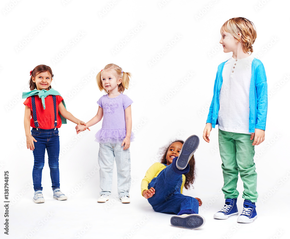 Studio portrait of children against white background: cutout of four ...