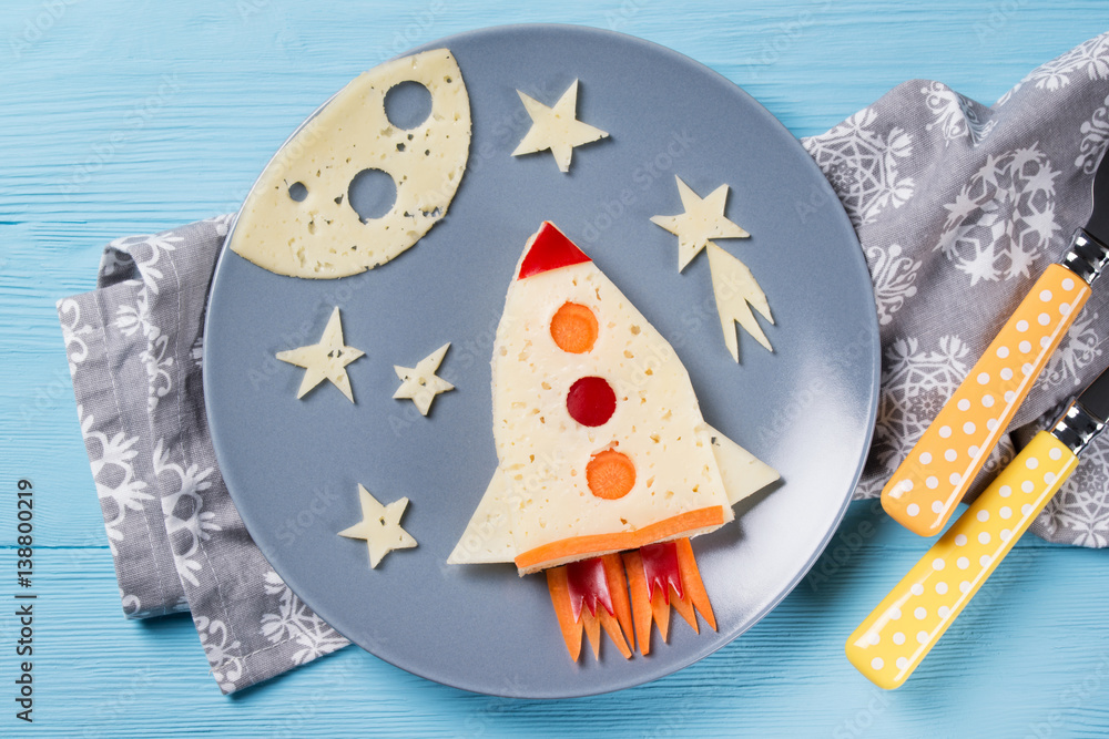 Funny sandwich with rocket and stars made of cheese, carrot and paprika ...