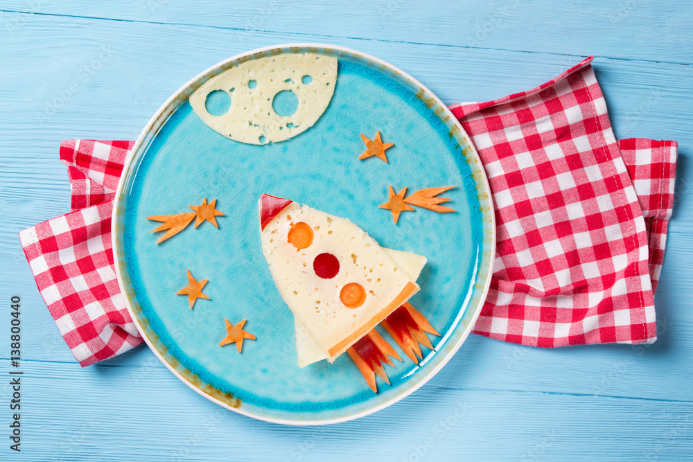 Funny sandwich with rocket and stars made of cheese, carrot and paprika ...