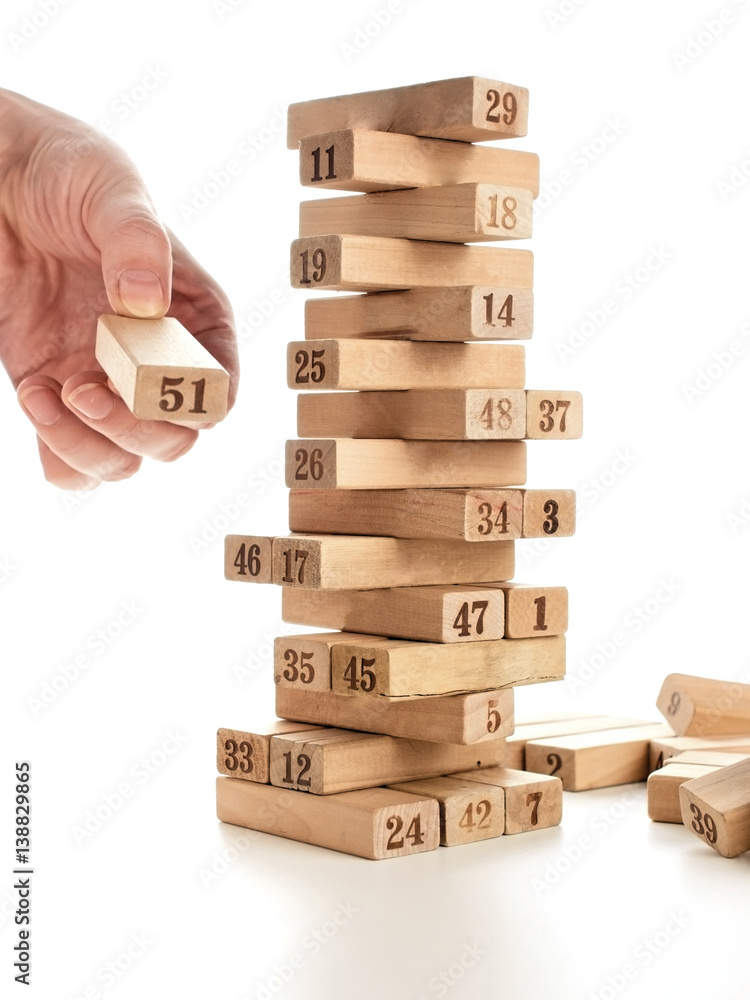 Blocks of game jenga isolated on white background. Vertical tower whole ...