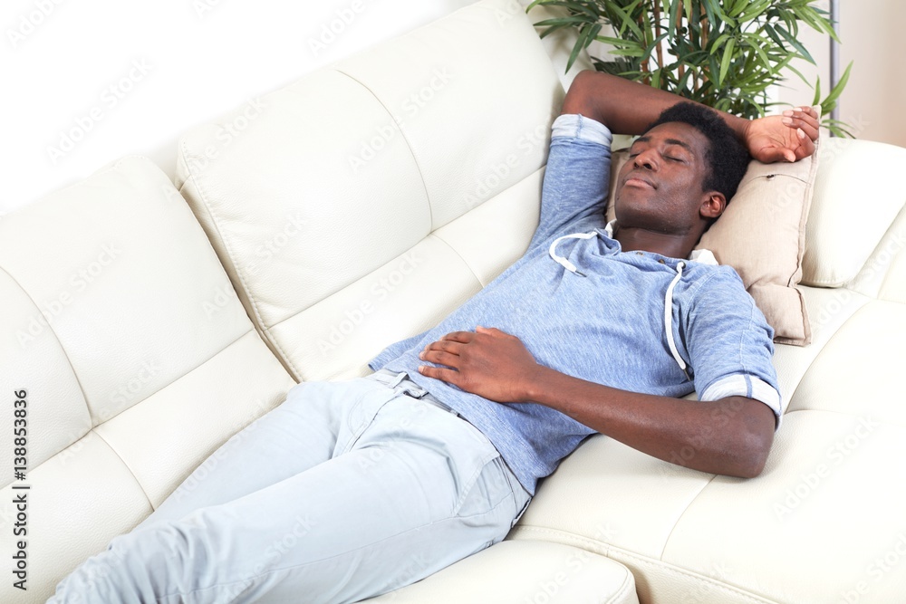 Sleeping black man. Stock Photo | Adobe Stock