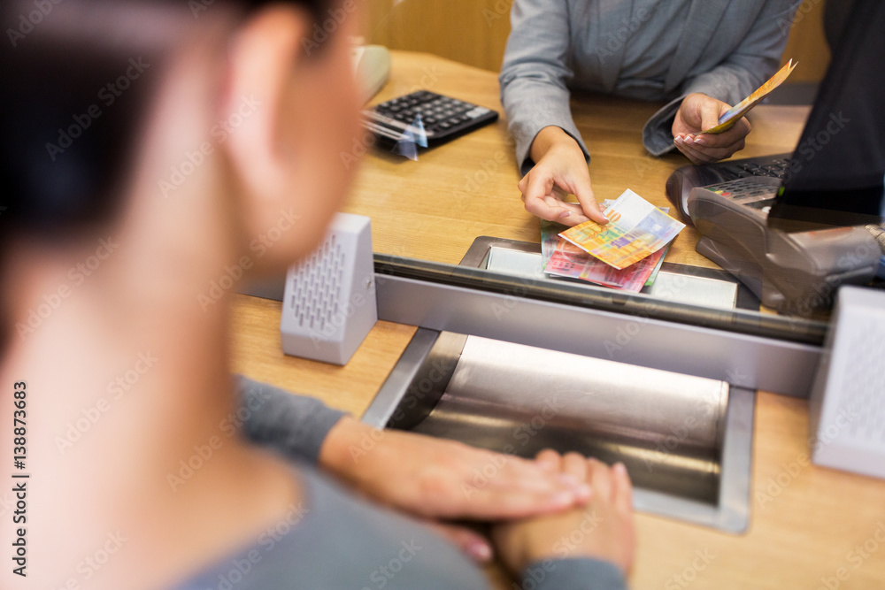 clerk counting cash money at bank office Stock-Foto | Adobe Stock