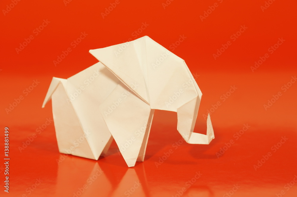 Paper origami elephant isolated on a colorful background Stock Photo ...