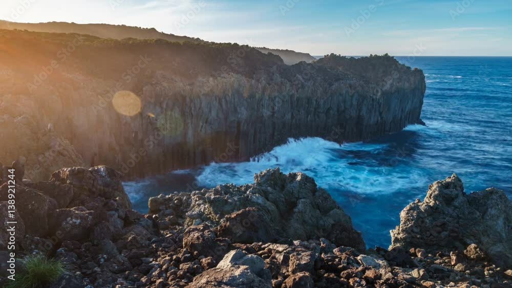 Video Stock Deep cliff over atlantic ocean at sunset with ray lights ...