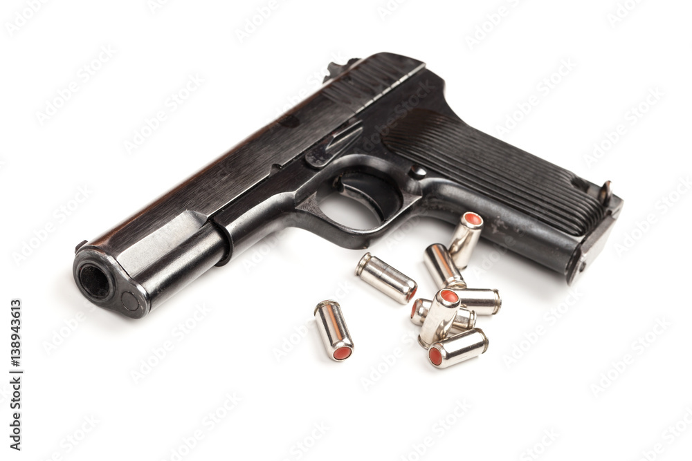 Pistol with bullets Stock Photo | Adobe Stock