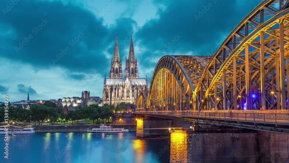 Cologne Cathedral and Hohenzollern Bridge in evening. Cologne, Germany ...
