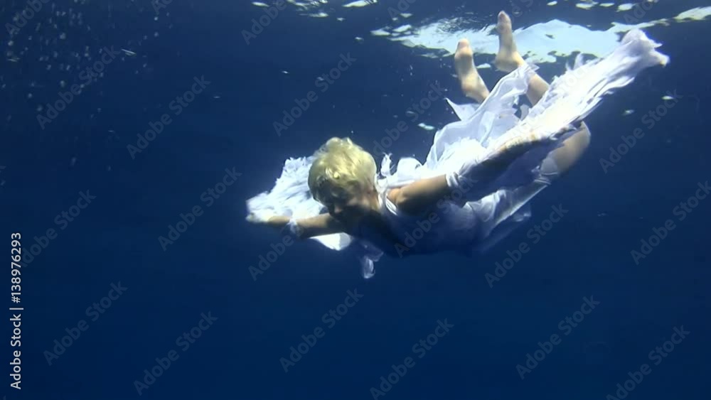 Underwater model free diver swims in mermaid costume in Red Sea ...